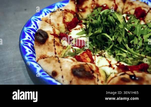 Authentic pizza making process in traditional Italian pizzeria, while ...