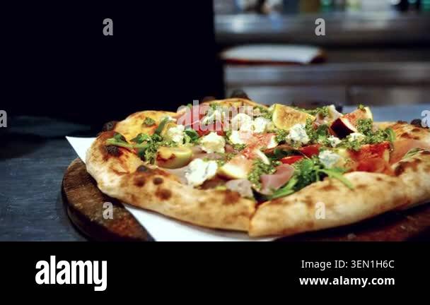 Authentic pizza making process in traditional Italian pizzeria, while ...