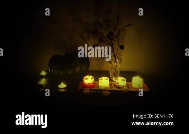 Group of burning candles on black background. Halloween candles burning ...