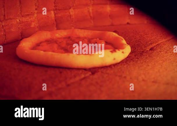 Authentic pizza making process in traditional Italian pizzeria, while ...