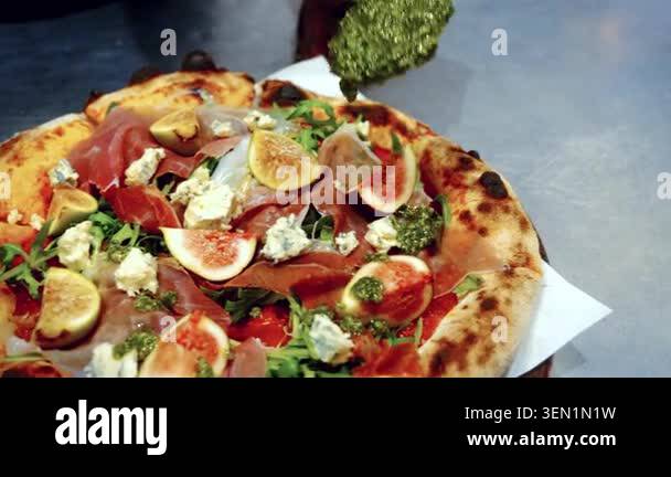 Authentic pizza making process in traditional Italian pizzeria, while ...