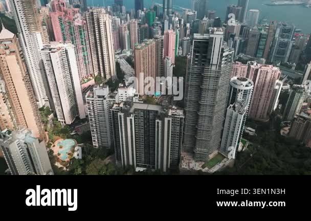 Aerial scenic drone footage of downtown Hong Kong viewed from Victoria ...