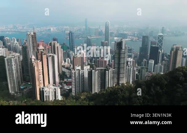 Aerial scenic drone footage of downtown Hong Kong viewed from Victoria ...