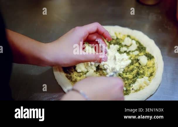 Authentic pizza making process in traditional Italian pizzeria, while ...