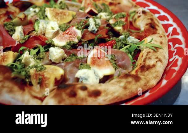 Authentic pizza making process in traditional Italian pizzeria, while ...