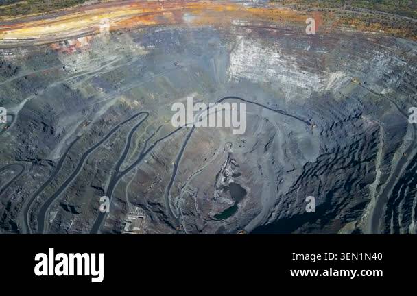Huge iron ore open pit mining of iron ore aerial 4K video Stock Video ...