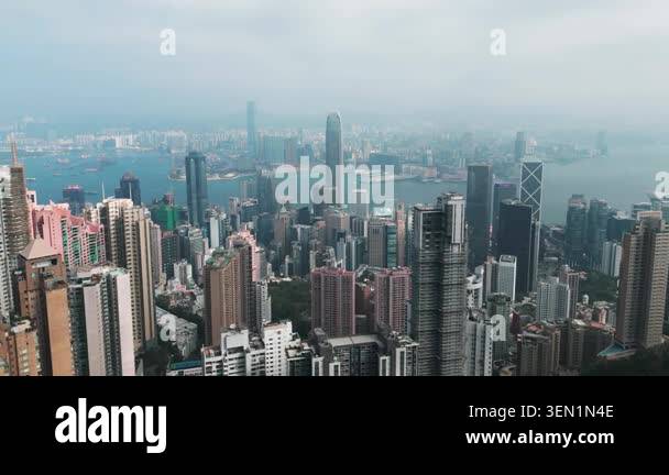Aerial scenic drone footage of downtown Hong Kong viewed from Victoria ...