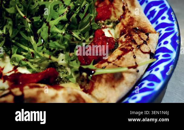 Authentic pizza making process in traditional Italian pizzeria, while ...