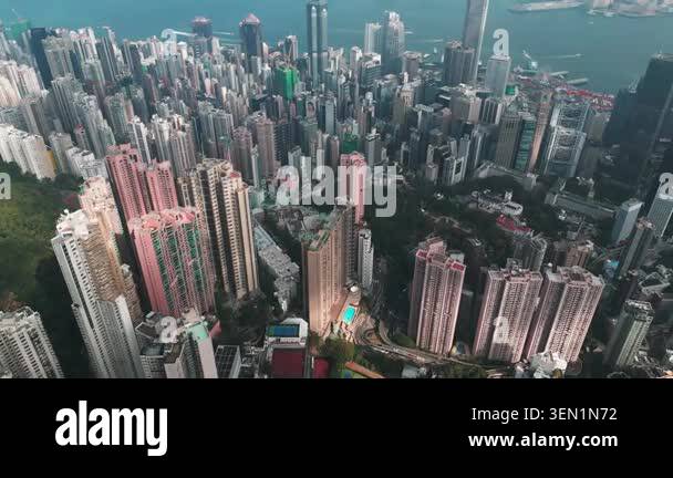 Aerial scenic drone footage of downtown Hong Kong viewed from Victoria ...