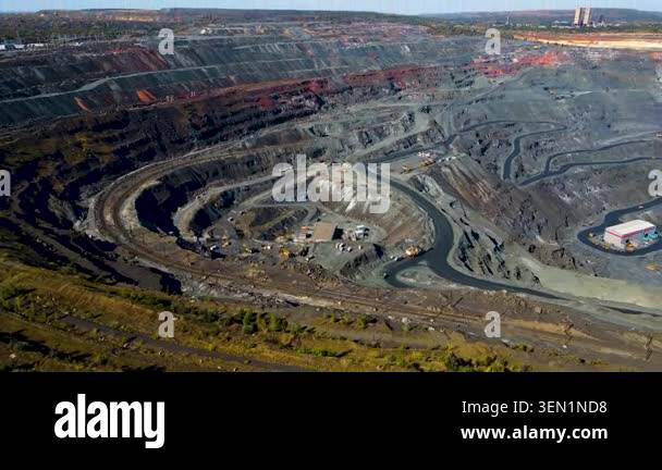 Huge iron ore open pit mining of iron ore aerial 4K video Stock Video ...