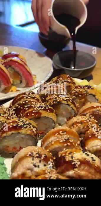 Large assortment of sushi rolls with salmon tuna Philadelphia and ...