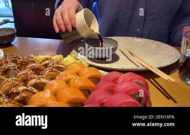 Large assortment of sushi rolls with salmon tuna Philadelphia and ...
