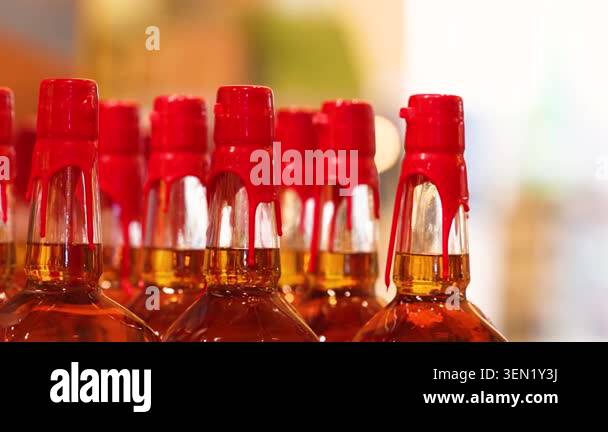 Rum bottles with caps tropical island spirit concept close up. High ...