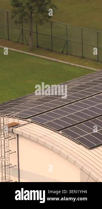 Solar panels on industrial warehouse roof for renewable energy ...