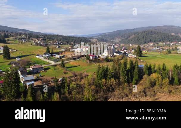 Aerial drone view of a peaceful rural village near Colibita, Bistrita ...