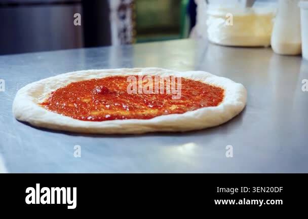 Authentic pizza making process in traditional Italian pizzeria, while ...