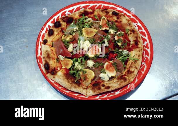 Authentic pizza making process in traditional Italian pizzeria, while ...