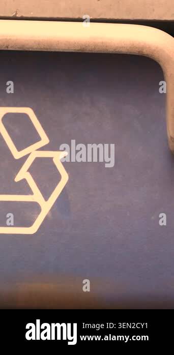 Recycle symbol on waste bin representing environmental sustainability ...