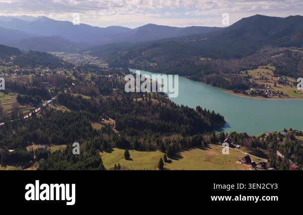 Aerial drone view of the Colibita lake with multiple inlets and ...
