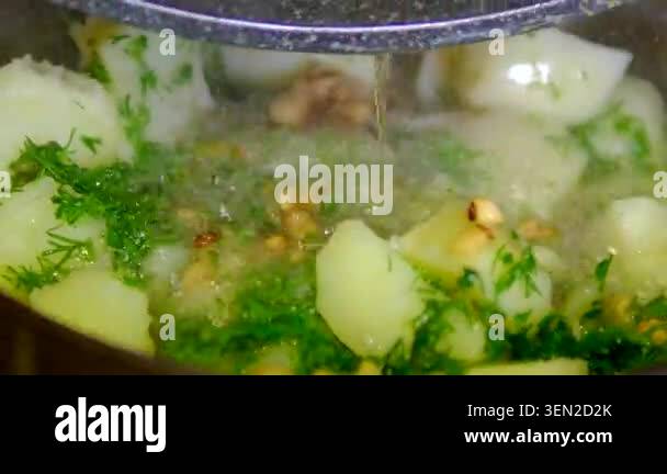 Golden cracklings and bubbling pork fat are poured onto boiled young ...