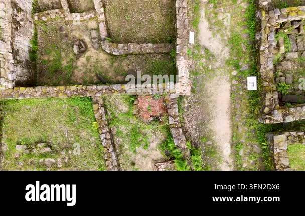 Aerial top down view ascending over the ancient ruins of Castro de ...