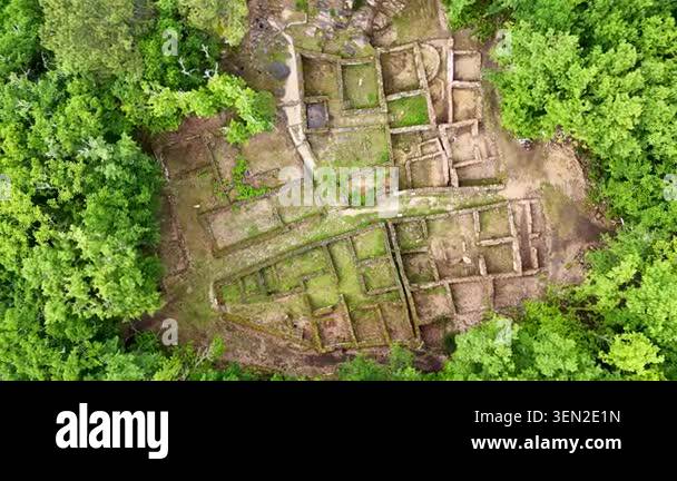 Top down aerial rotating footage of the Castro de Armea ruins. An ...