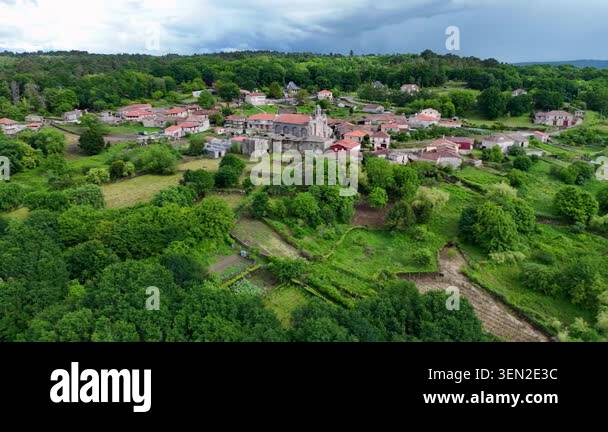 Picturesque small village in the green countryside of Galicia. Aerial ...