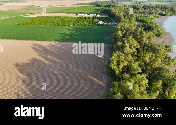 Aerial view of a rural landscape with various crops growing in ...