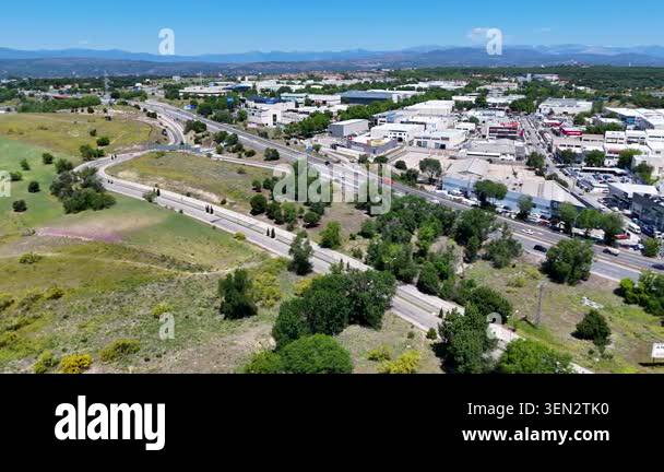 Las Rozas de Madrid, Spain, May 28, 2026: Aerial view of an industrial ...