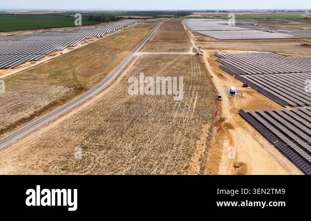 Expansive aerial perspective of a new photovoltaic power plant ...