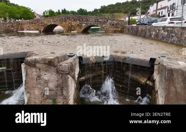 San Nicolas del Puerto, Spain, May 28, 2026: Water cascading through a ...