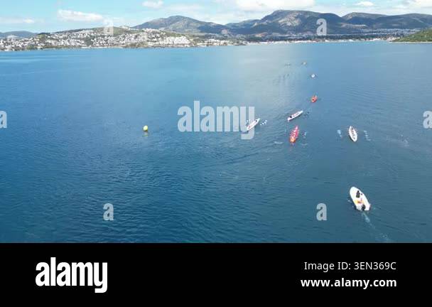 Aerial View of Professional Rowing Teams Competing in a Regatta near ...