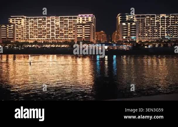 Night City Skyline River Reflections Glow With Illuminated Hotel ...