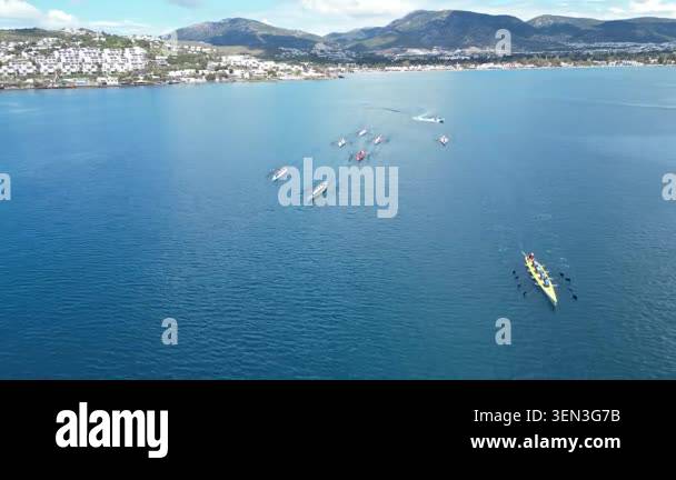 Aerial View of Professional Rowing Teams Competing in a Regatta near ...
