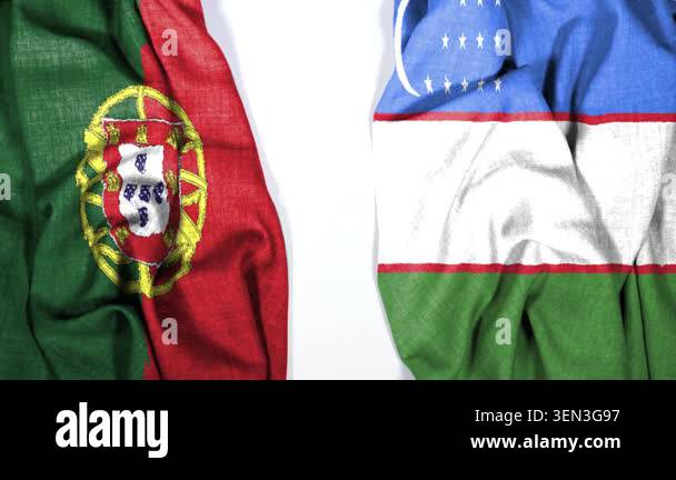 waving colorful flag of portugal and national flag of uzbekistan Stock ...