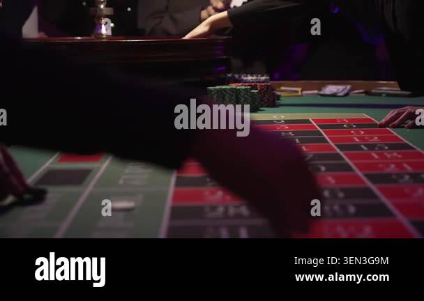 White Player Placing Chips On Roulette, Closeup Green Felt, Red And ...