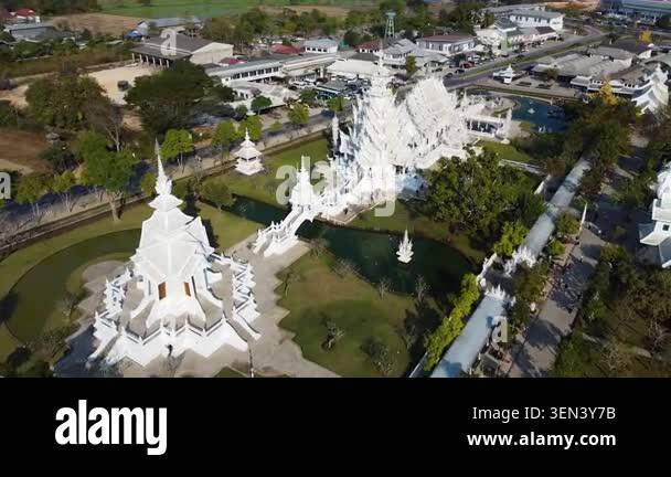 Breathtaking aerial footage orbiting the magnificent wat rong khun ...