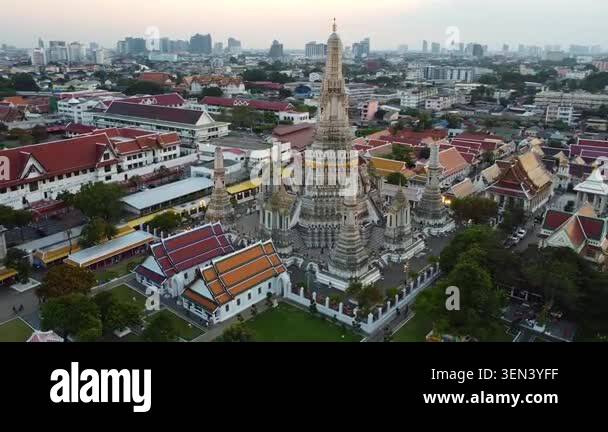 Aerial footage orbiting the iconic wat arun ratchawararam temple ...