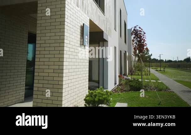 Minimalist architectural design of modern residential townhouses in a ...