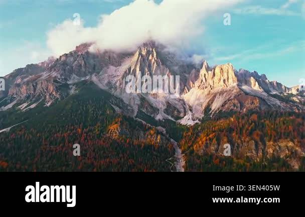 Aerial hyperlapse of high mountain peak with clouds. Cristallo mountain ...