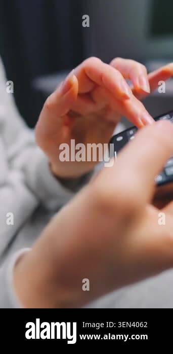 Female hands typing text on smartphone close-up. Communication concept ...
