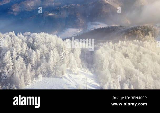 Winter mountain landscape. A tranquil and serene winter scene showcases ...