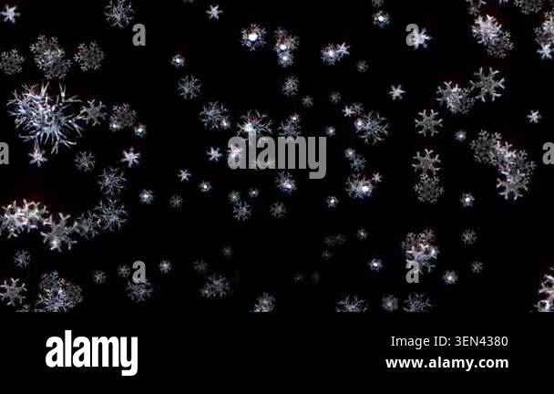 snowflakes on a black background Stock Video Footage - Alamy