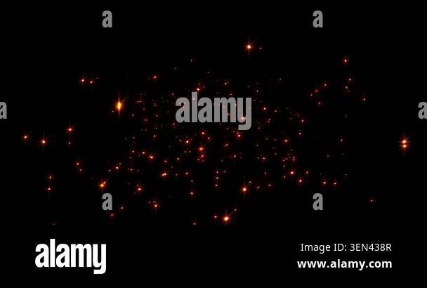 Shiny fire particles sparks moving with the wind over black background ...