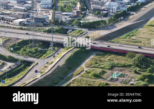 Aerial view showing roads and green landscape Stock Video Footage - Alamy