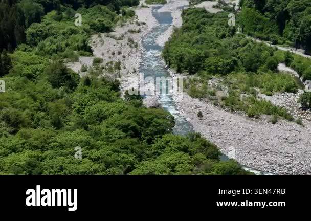 Aerial view of river flowing through greenery Stock Video Footage - Alamy