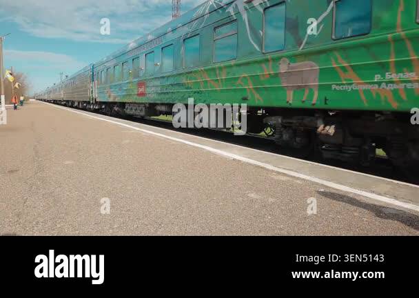 railway station with a red car Stock Video Footage - Alamy