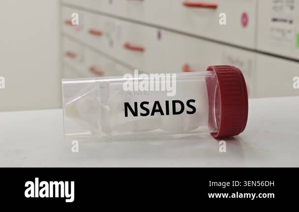 NSAIDS tablets used to relieve pain inflammation and fever Stock Video ...