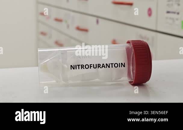 NITROFURANTOIN tablets for treat urinary tract infections Stock Video ...