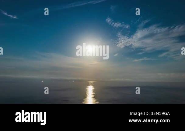 Moonrise over calm Mediterranean Sea during full night timelapse ...